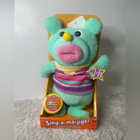 Mattel | Toys | Singamajigs Green Plush Toy Sings Its Raining Its ...